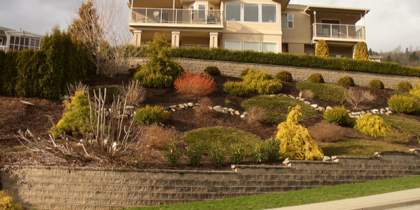 My Freestanding Retaining Brick Wall Is Sinking! What Do I Do?